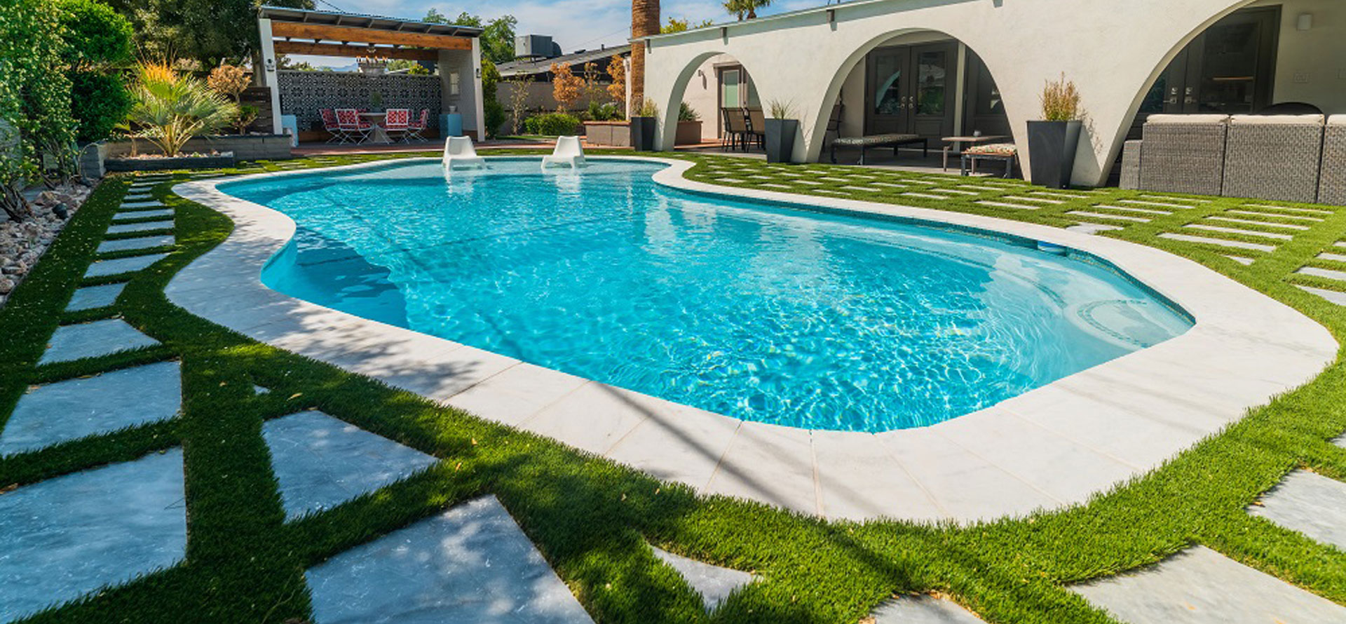 Pool Upgrades | Fountains, Lighting, Slides, Decking, and More